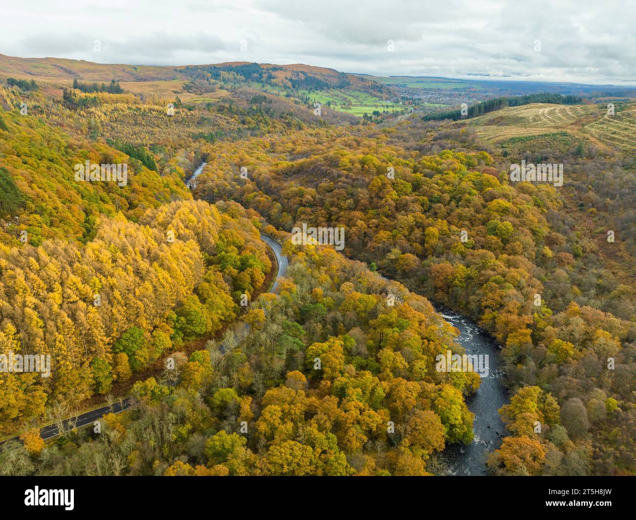 Aerial view of autumn colours beside the Garbh Uisge river in the Pass ...