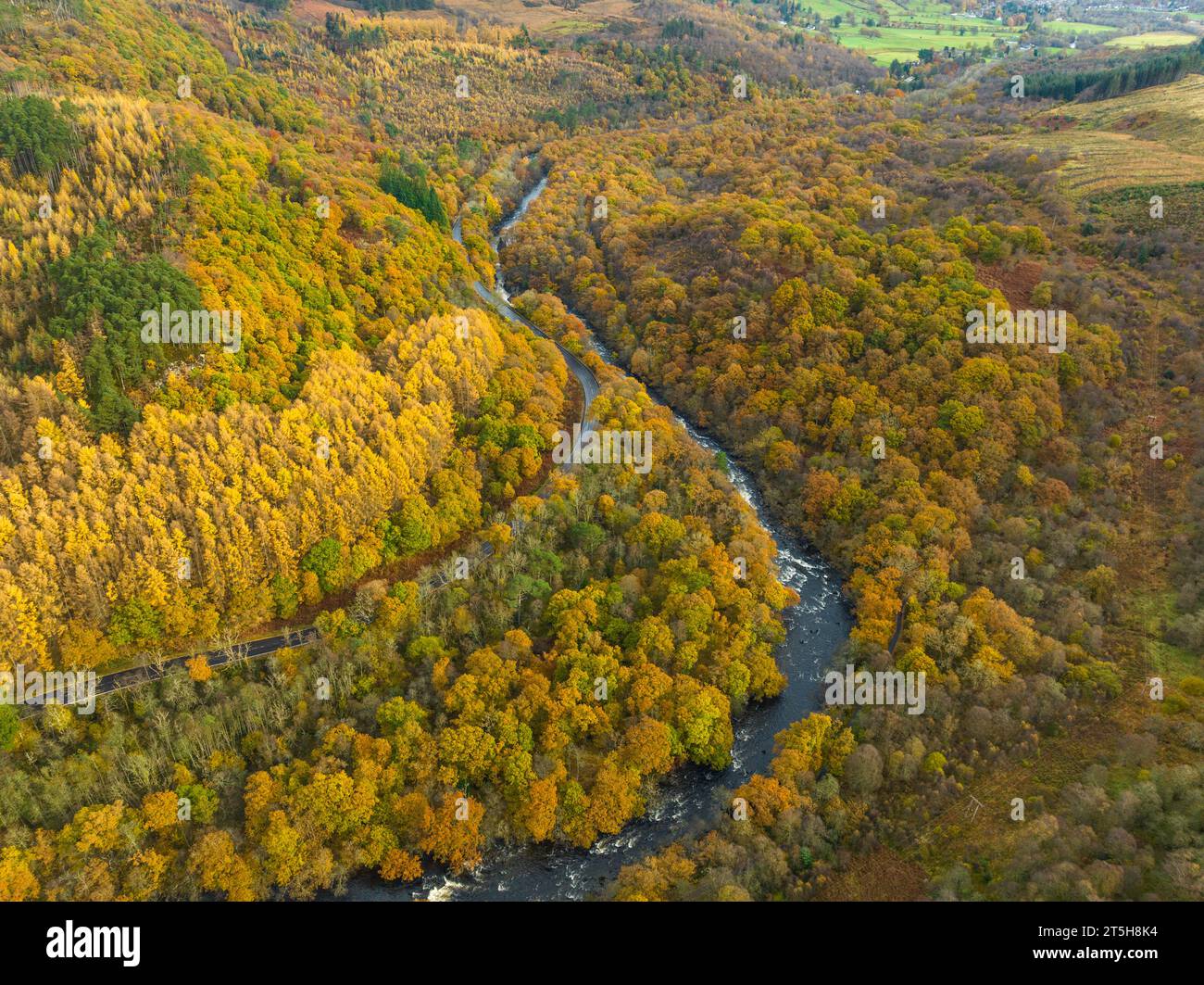 Aerial view of autumn colours beside the Garbh Uisge river in the Pass ...