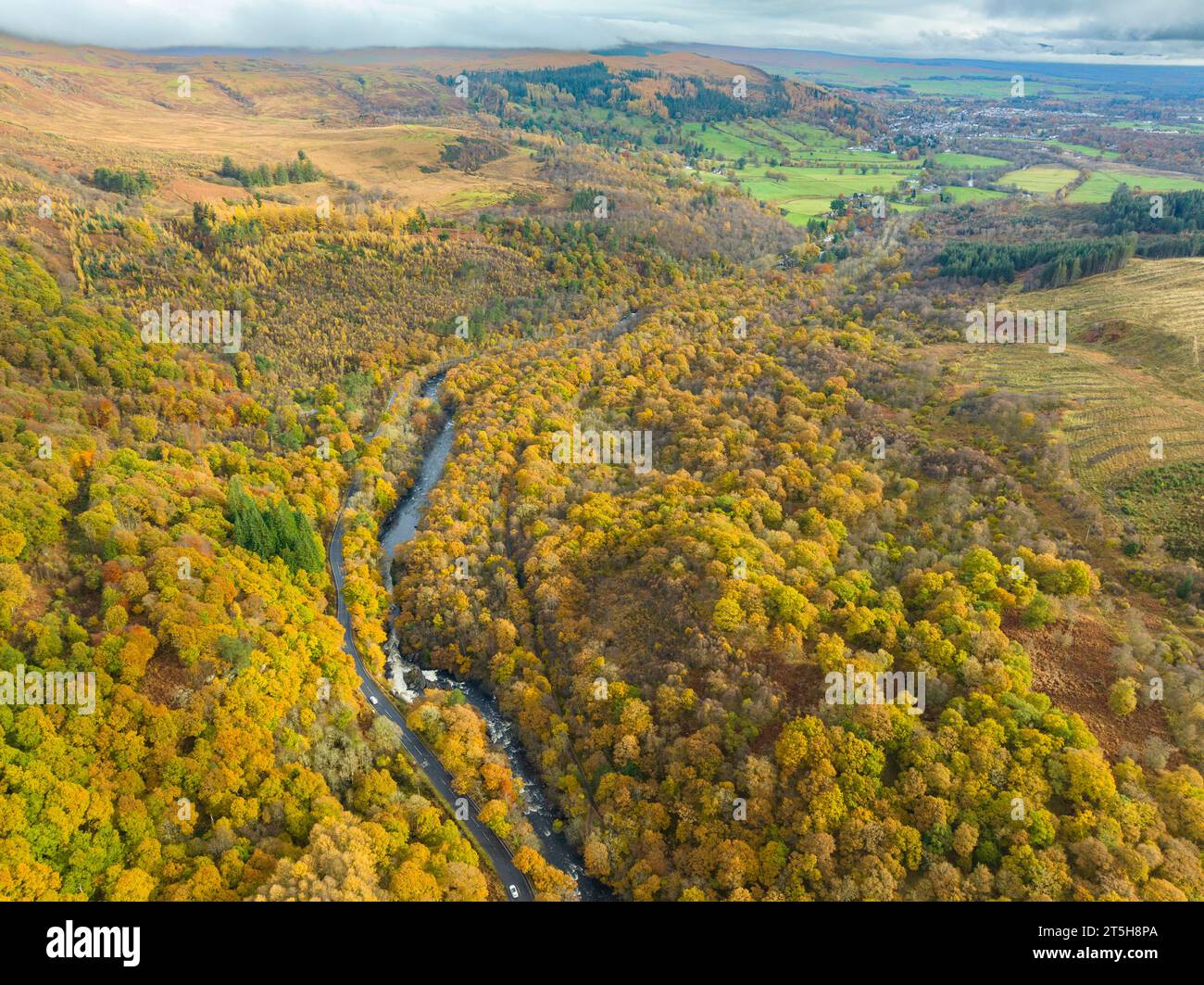 Aerial view of autumn colours beside the Garbh Uisge river in the Pass ...