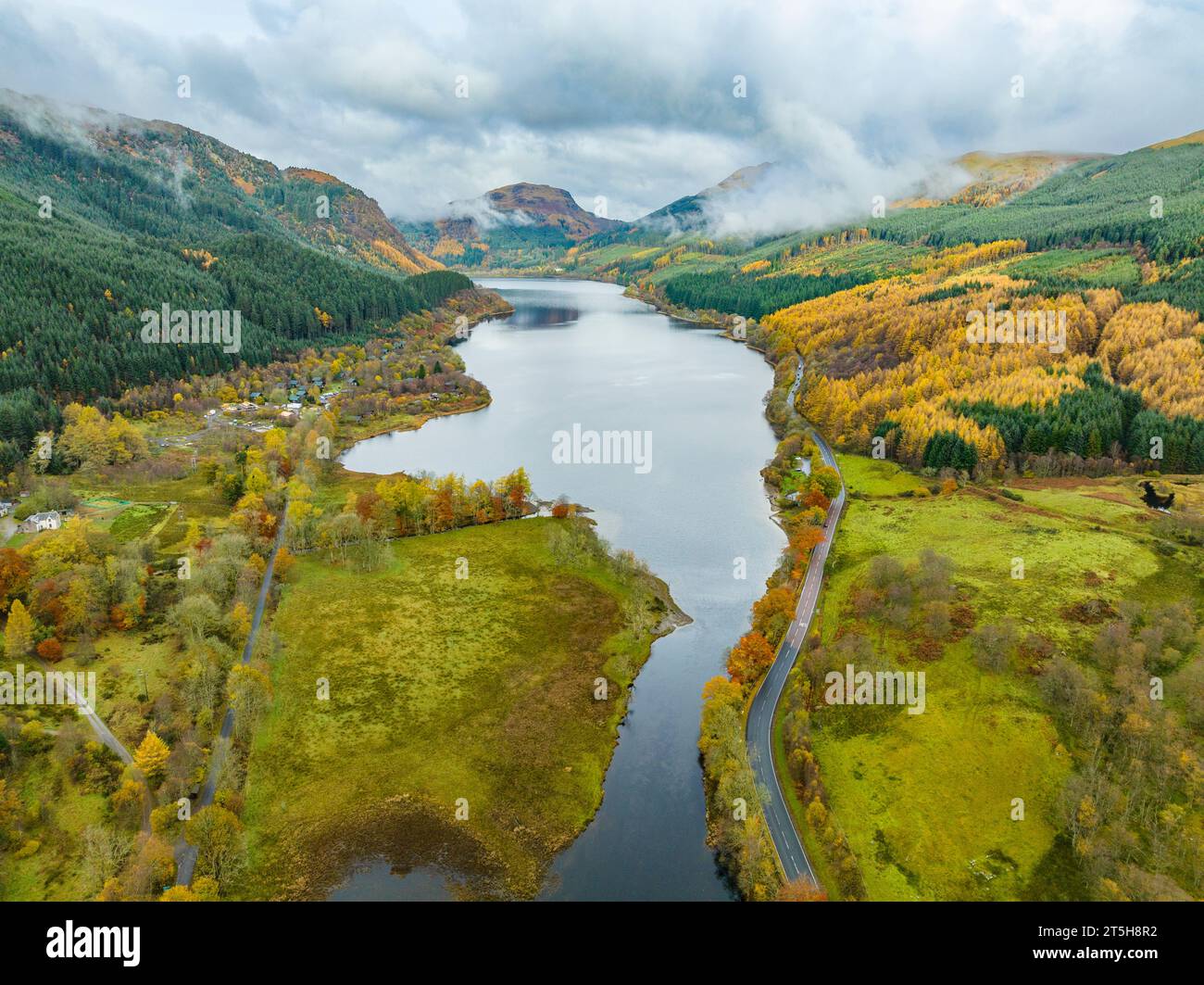 Aerial view of autumn colours beside the Garbh Uisge river and Loch ...
