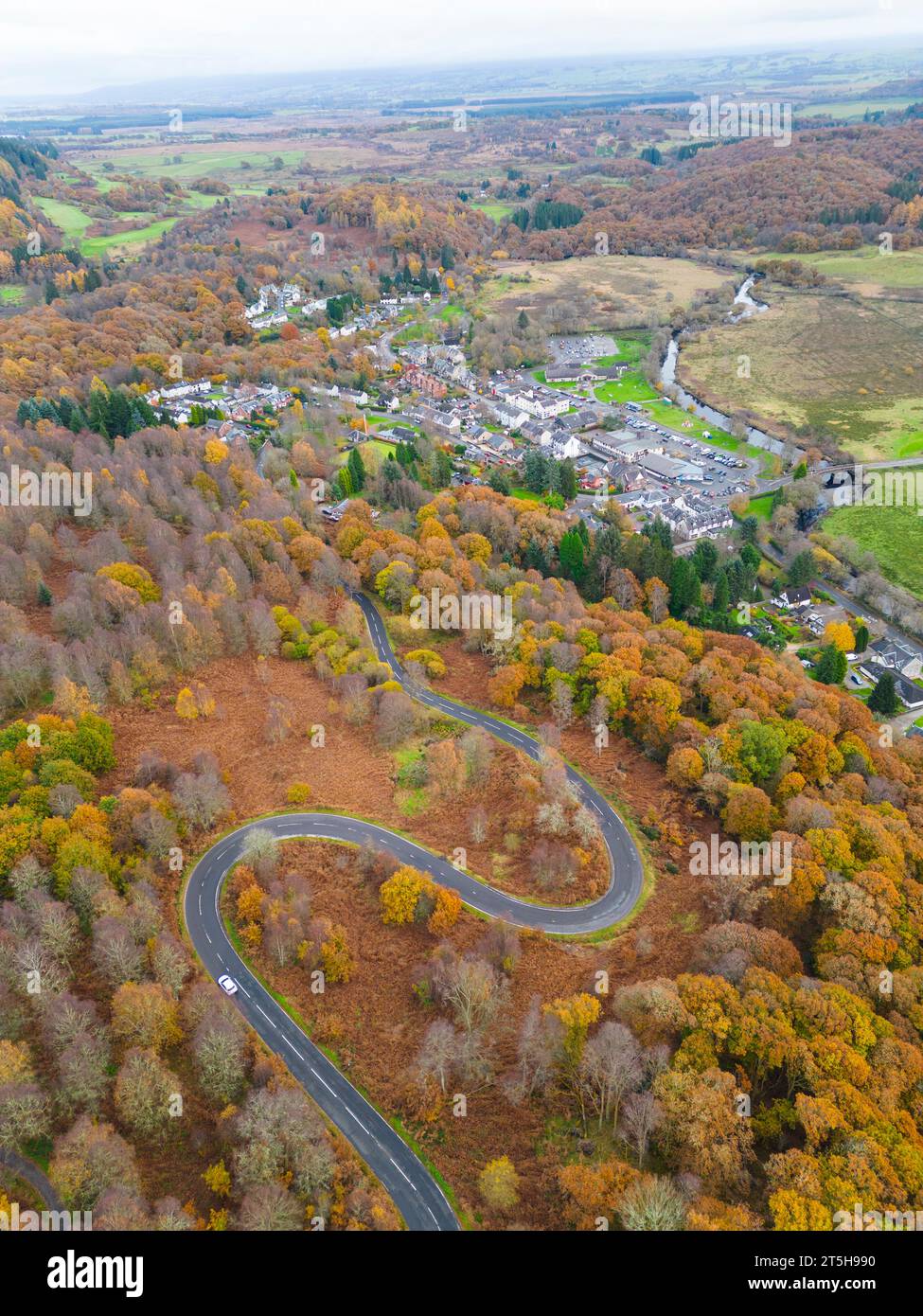 Aerial view of rural road on the Duke’s Pass in The Trossachs in autumn ...