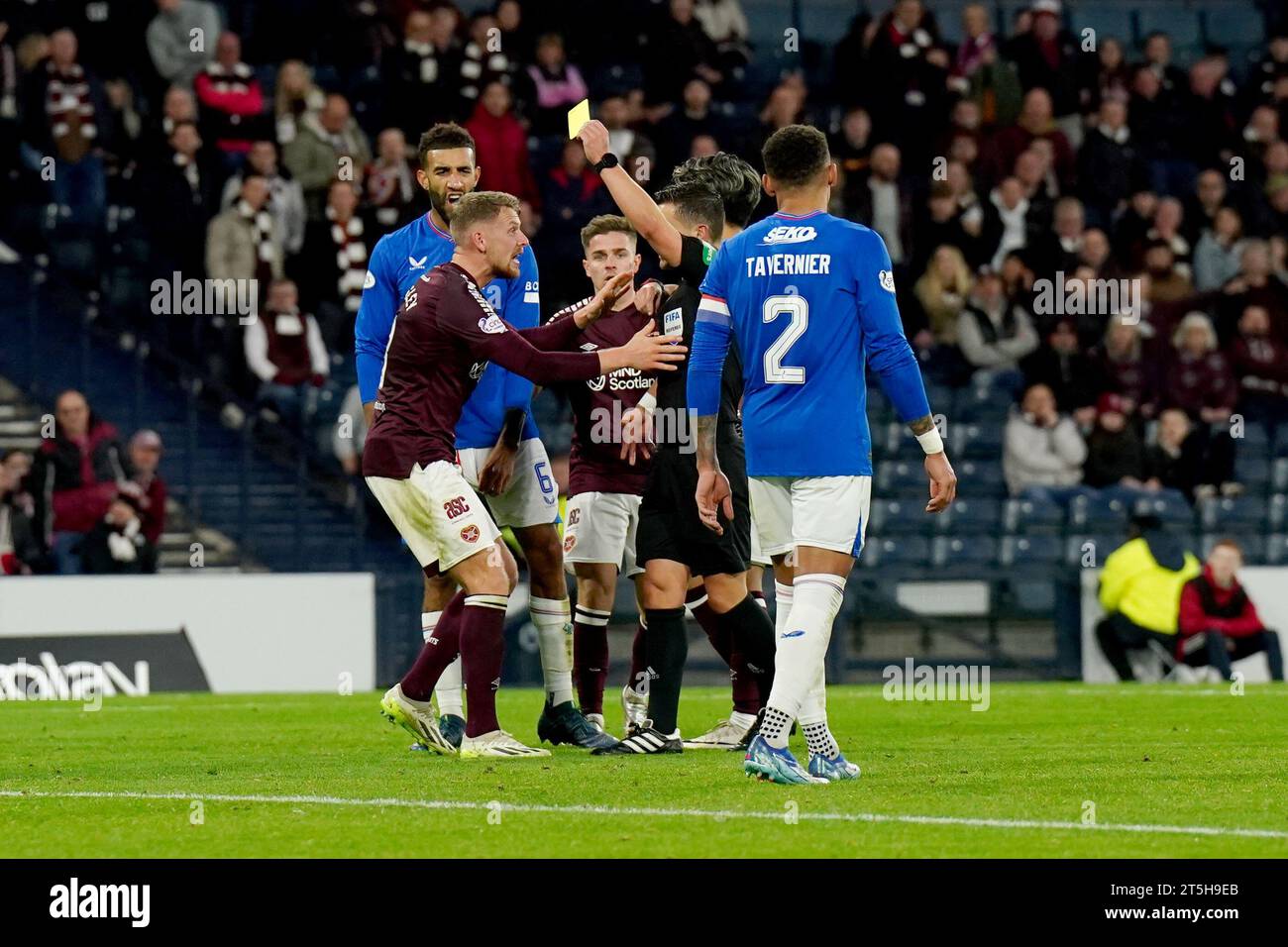 Heart of Midlothian's Stephen Kingsley is initially shown a second ...