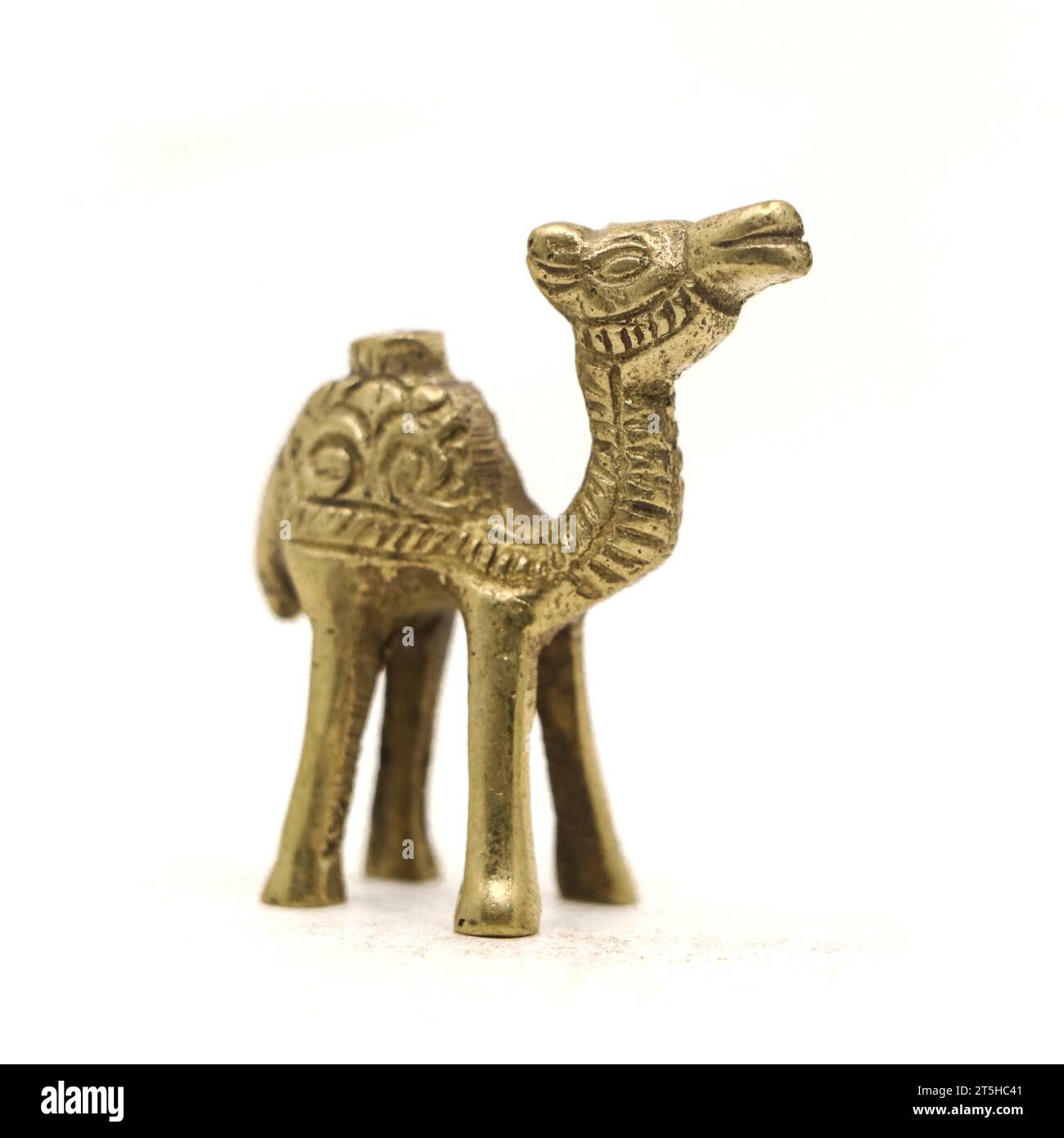 a vintage camel figure carved with beautiful details in golden brass ...