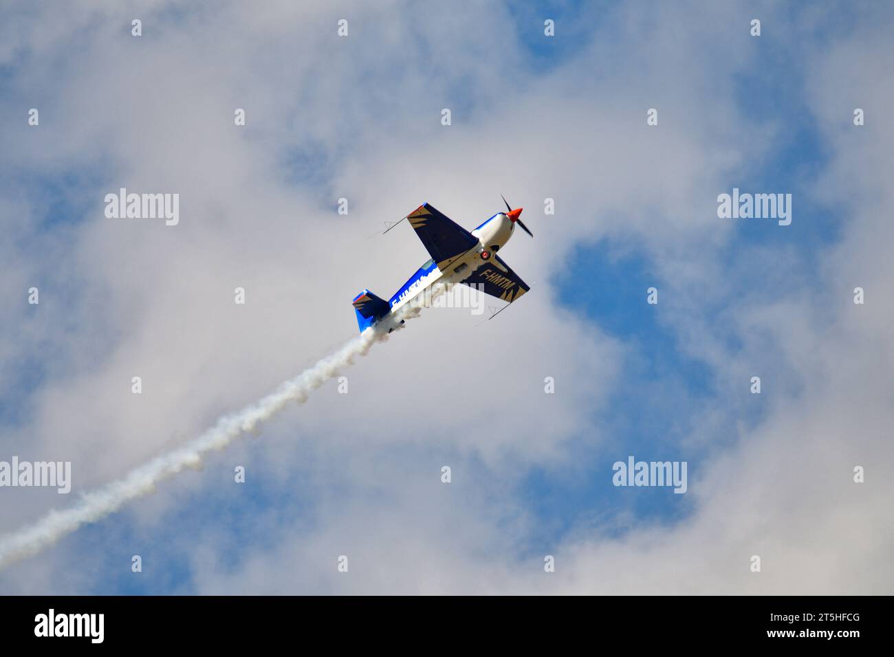 Skopje, Macedonia. The French acrobatic plane Extra 330SC with a trail ...