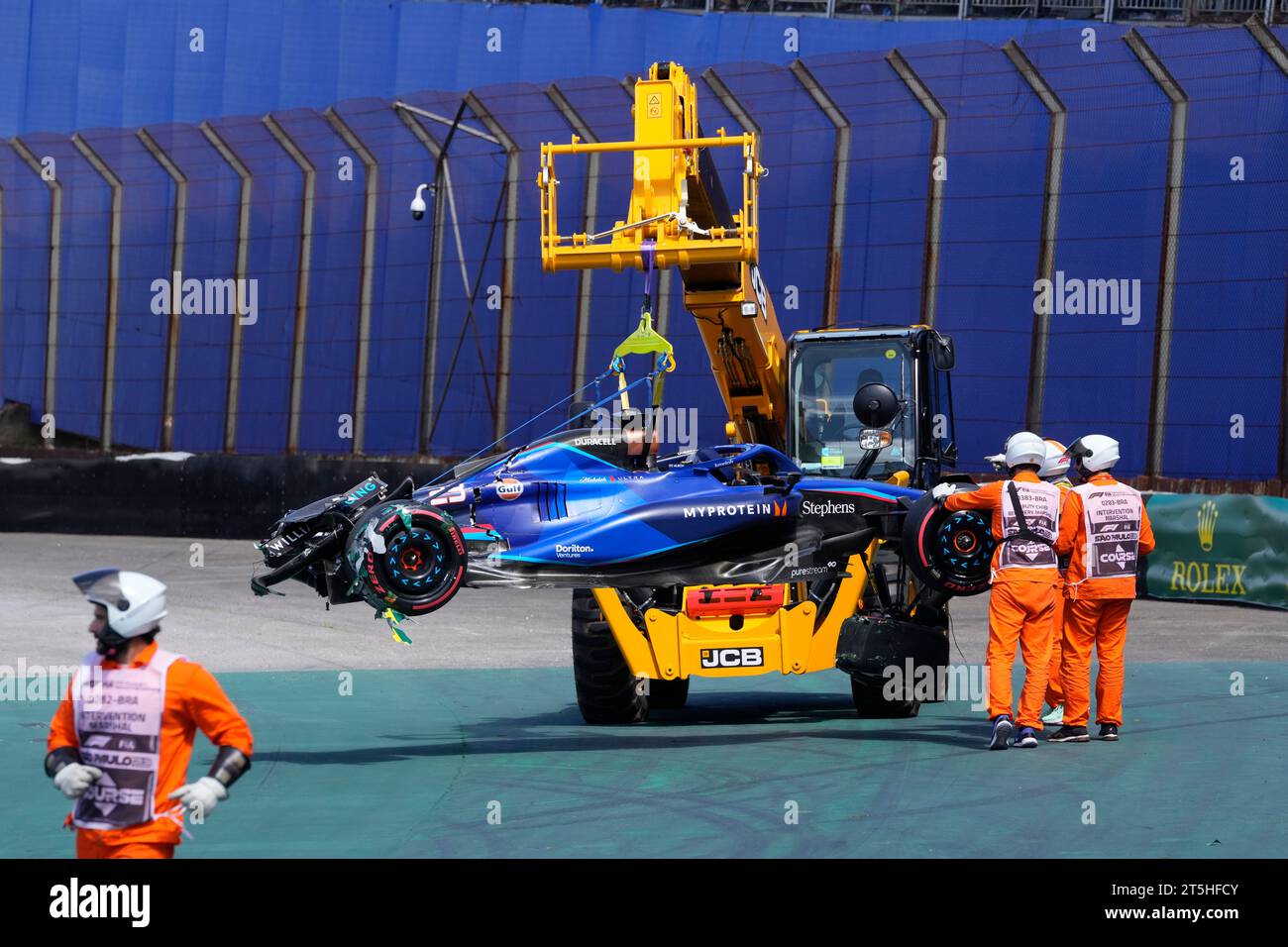 The Williams car of Alexander Albon of Thailand is lifted from the ...