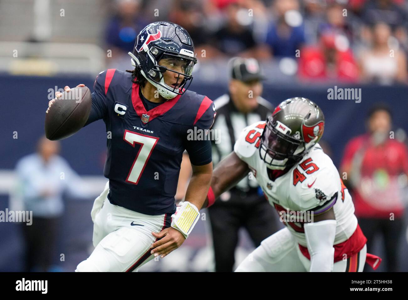 Houston Texans quarterback C.J. Stroud (7) rolls out with Tampa Bay ...