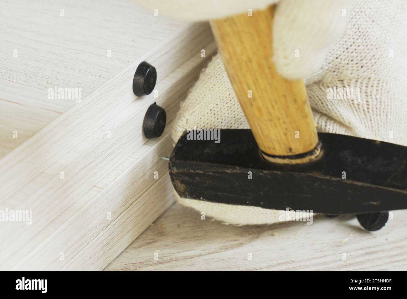 Furniture assembly worker hammers hi-res stock photography and images ...