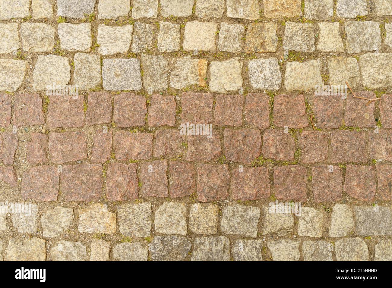 The road is paved with square granite stones. View from above Stock ...
