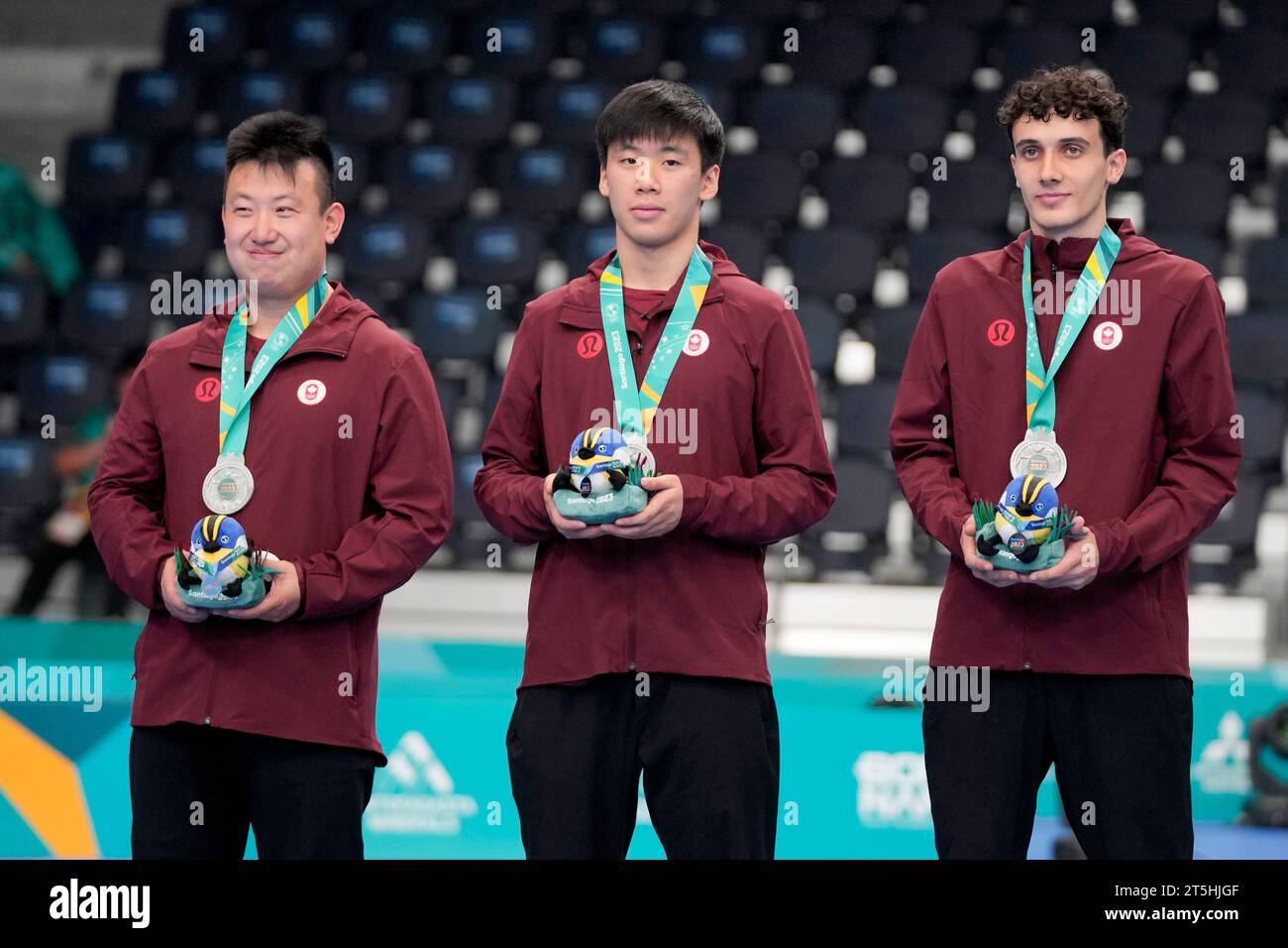 From left, Canada's Eugene Wang, Edward Ly and Simeon Martin pose with ...