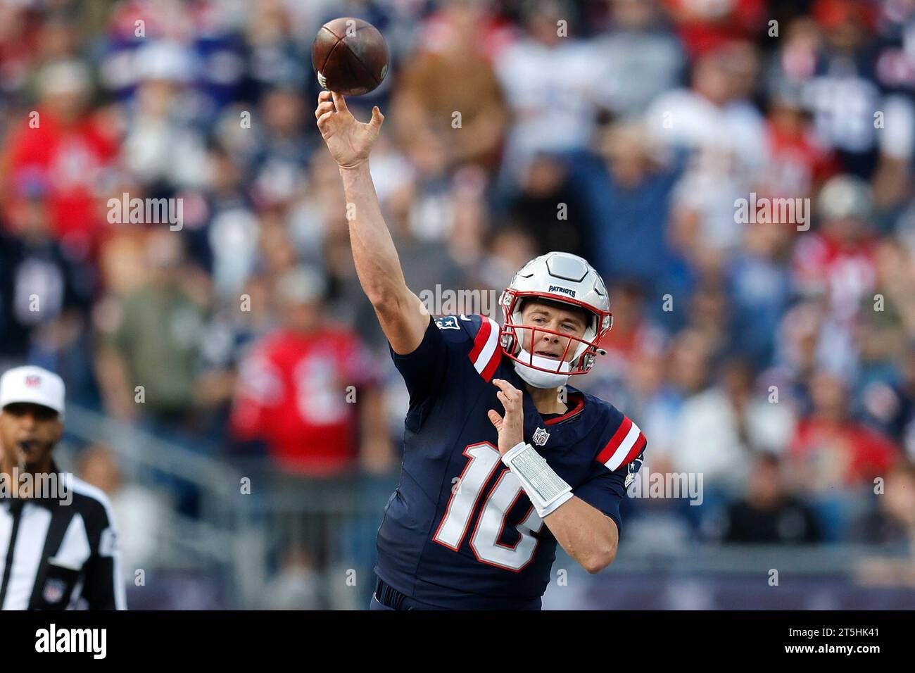 New England Patriots quarterback Mac Jones passes in the first half an ...
