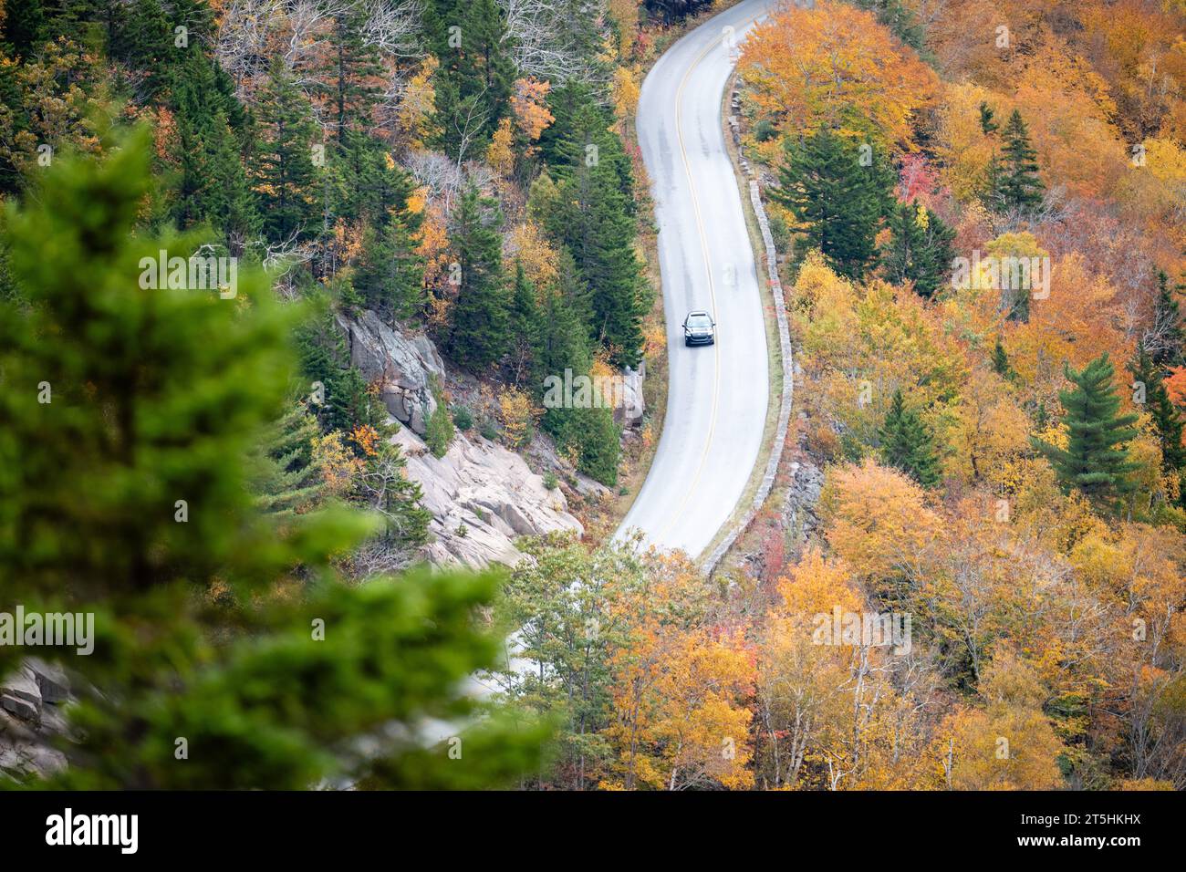 Cars drive down winding road hi-res stock photography and images - Alamy