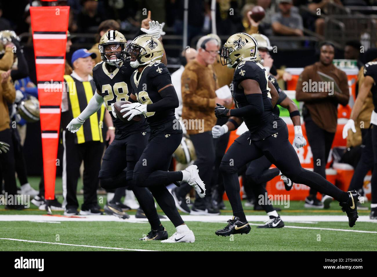 New Orleans Saints cornerback Paulson Adebo , center, celebrates with ...