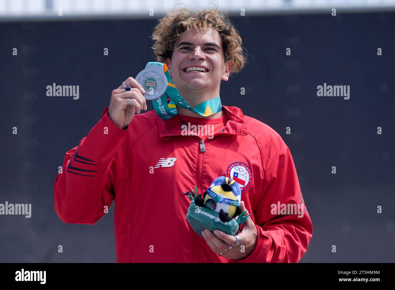 Chile's Jose Manuel Cedano poses with the silver medal at the podium of ...