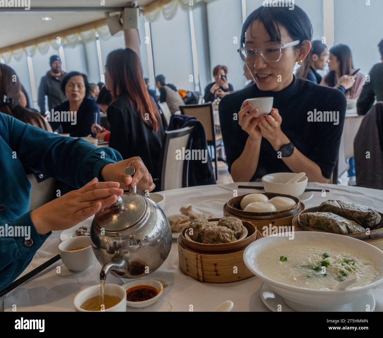 Chinese people eating Dim Sum at a restaurant in London,England,UK ...