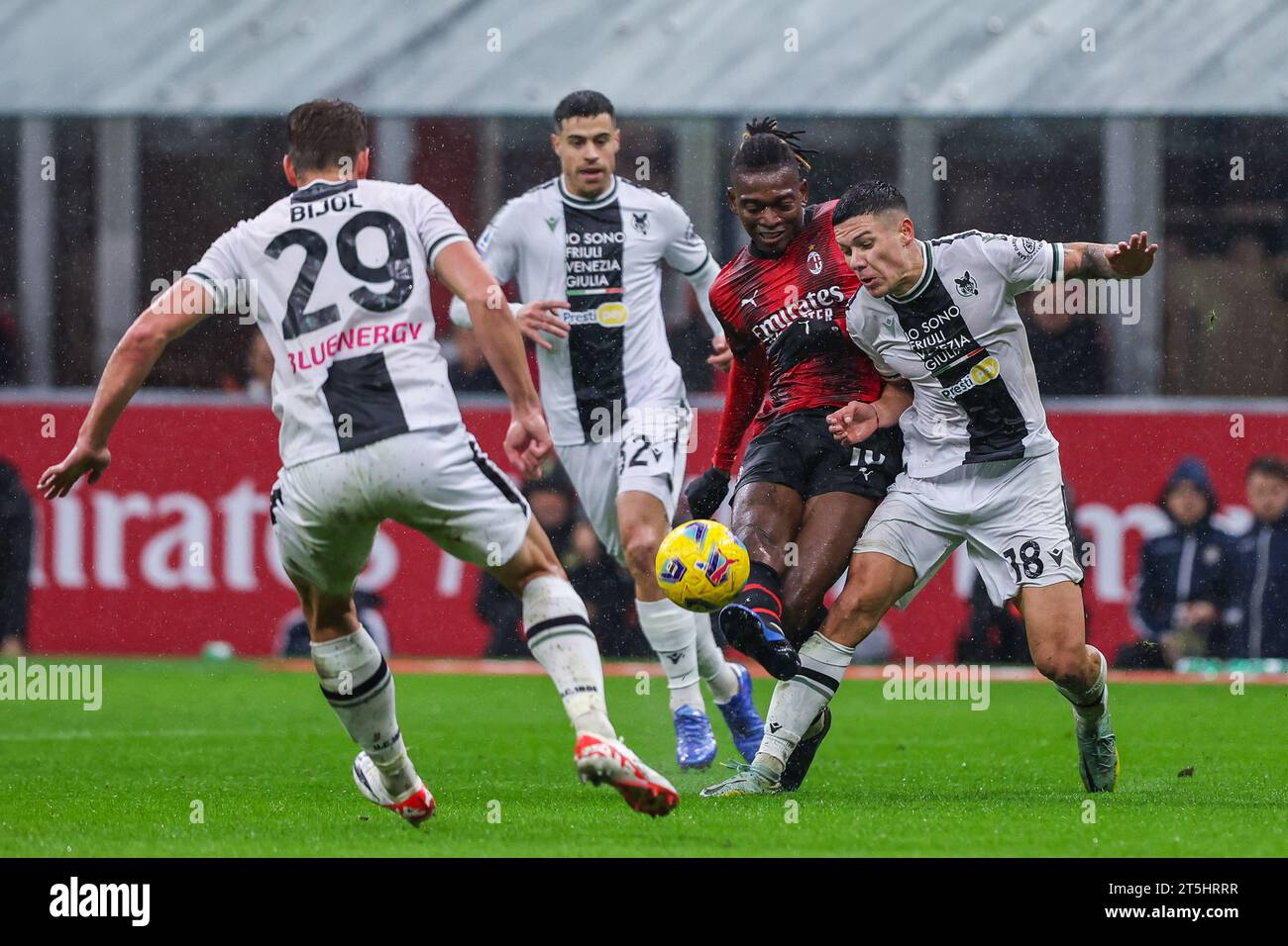 Rafael Leao (C) of AC Milan, Nehuen Perez (R) and Jaka Bijol of Udinese ...