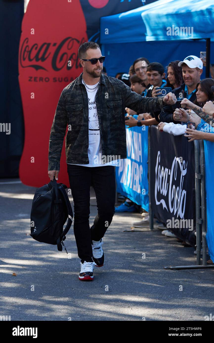 Carolina Panthers wide receiver Adam Thielen (19) bumps fists with fans ...