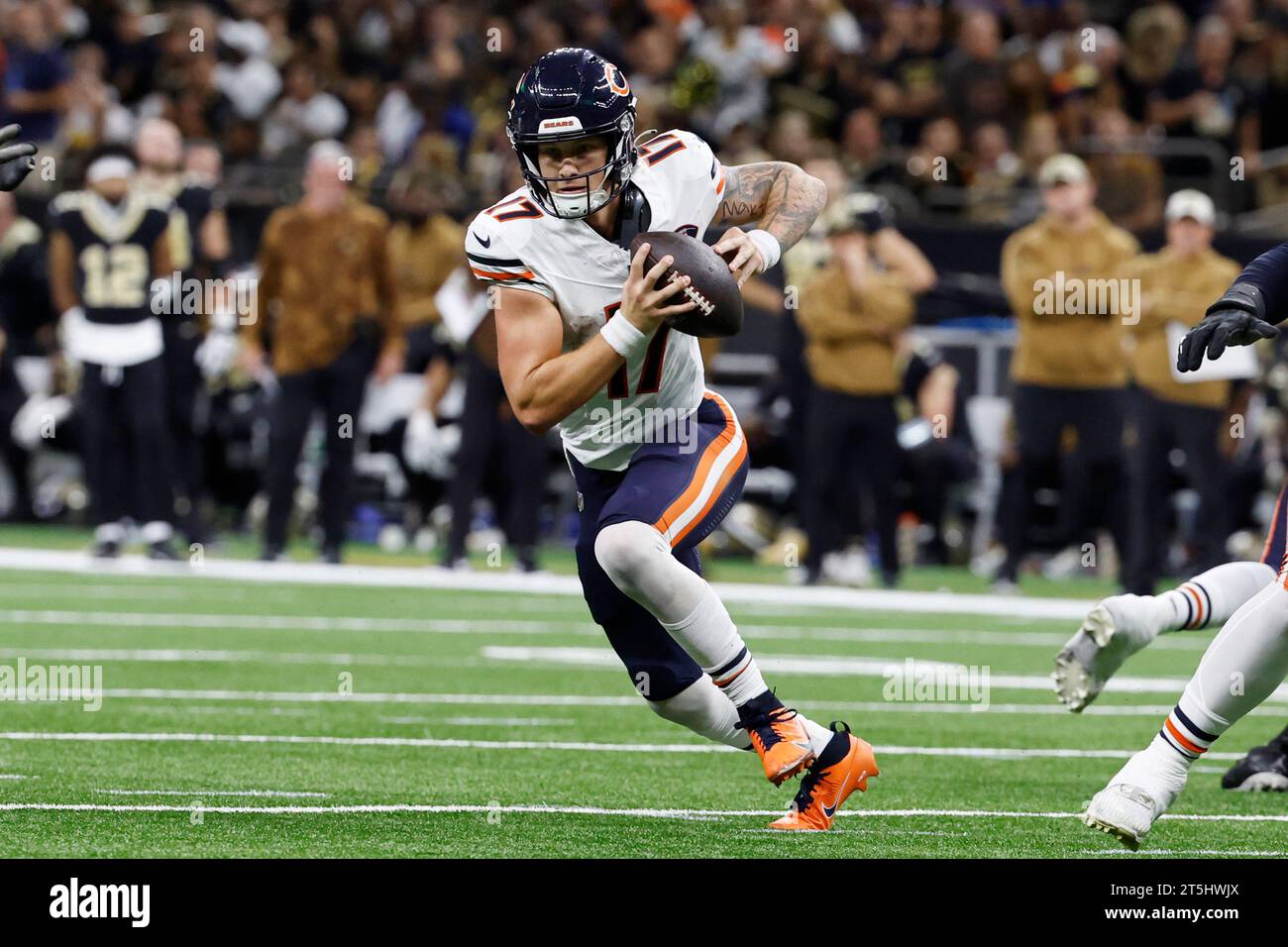Chicago Bears quarterback Tyson Bagent (17) runs during the first half ...