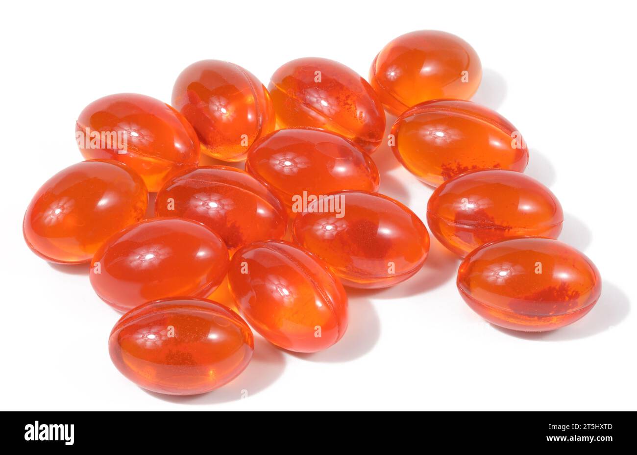 Orange capsules with fish oil on a white background, close up Stock ...
