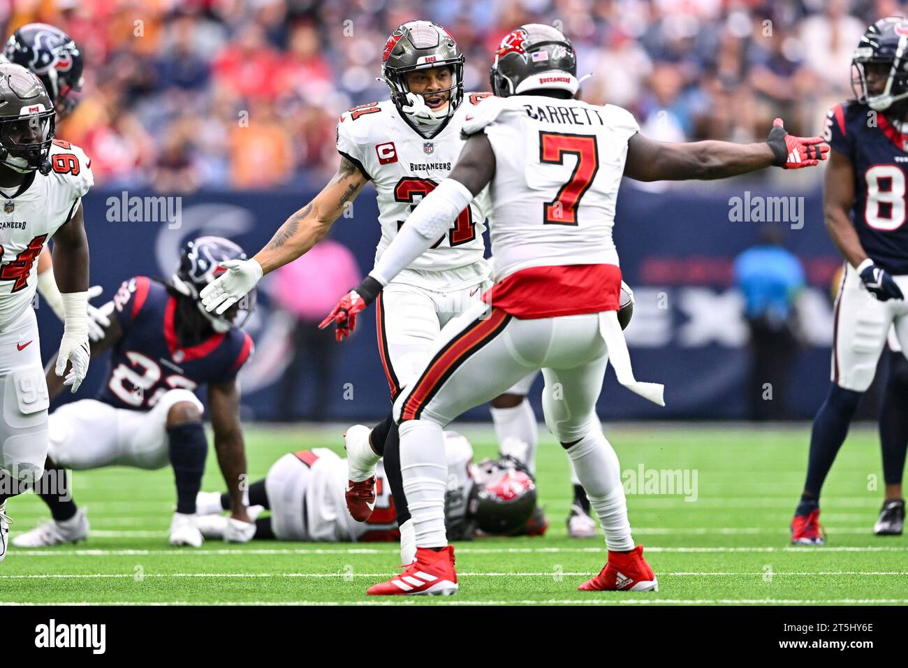 Tampa Bay Buccaneers linebacker Shaquil Barrett (7) and safety Antoine Winfield Jr. (31) react ...