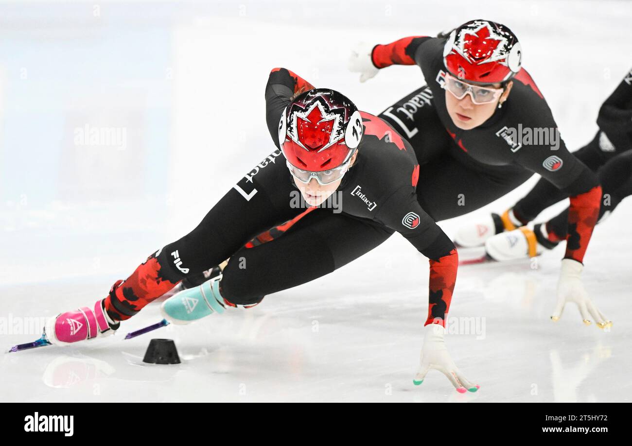 Danae Blais (13) and Courtney Sarault (2) of Canada skate during the ...