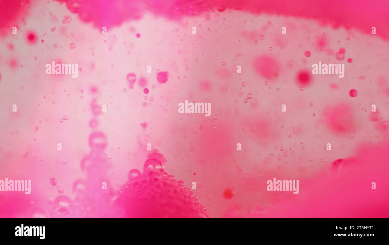 Bubble fluid oil texture paint water drop pink gel Stock Photo - Alamy