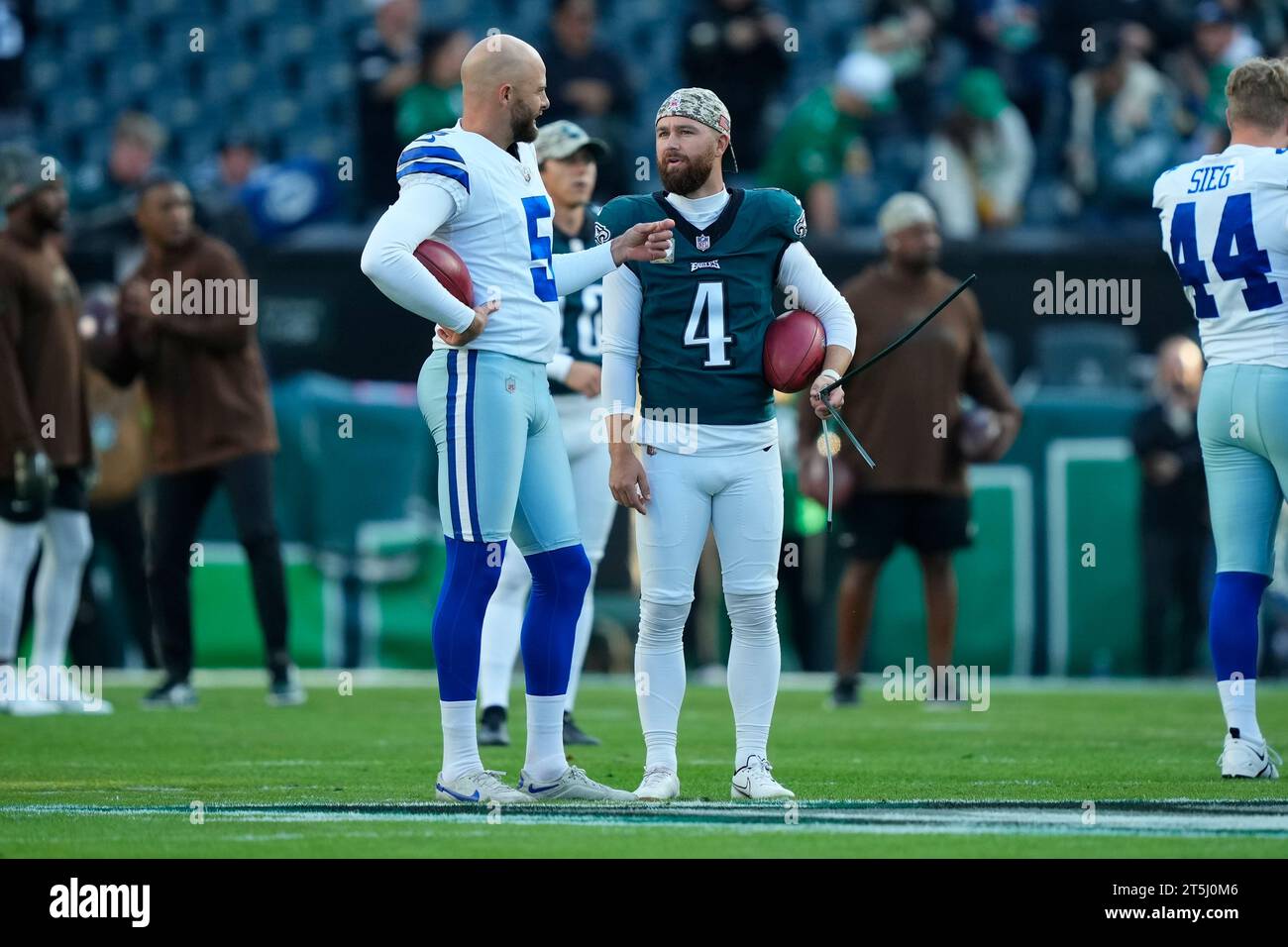 Dallas Cowboys punter Bryan Anger (5) speaks with Philadelphia Eagles ...