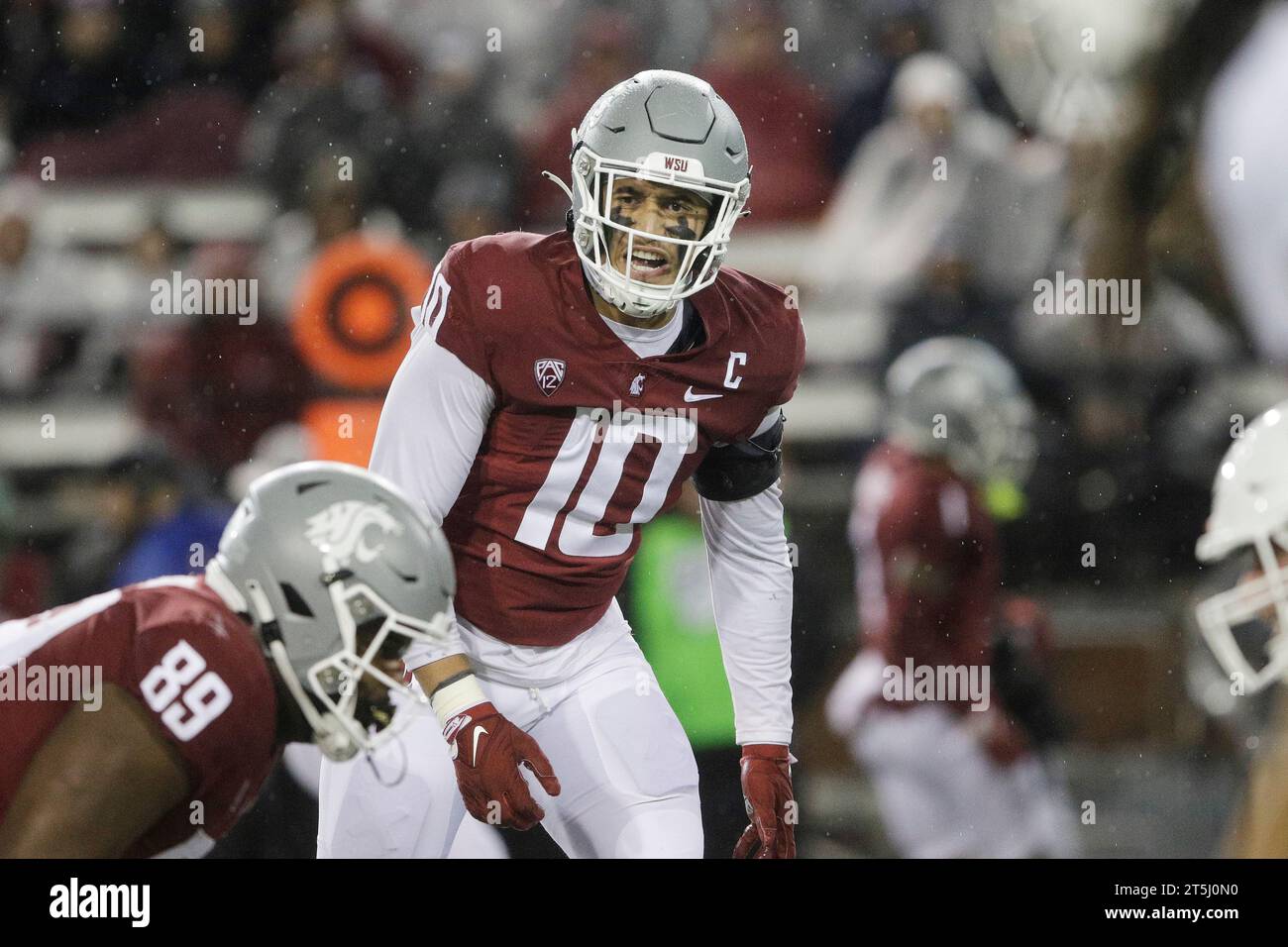 Washington State defensive end Ron Stone Jr. (10) lines up for a play ...