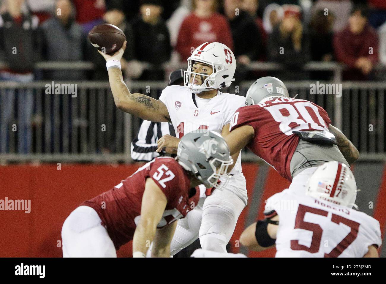 Stanford quarterback Ashton Daniels, center, throws a pass while ...
