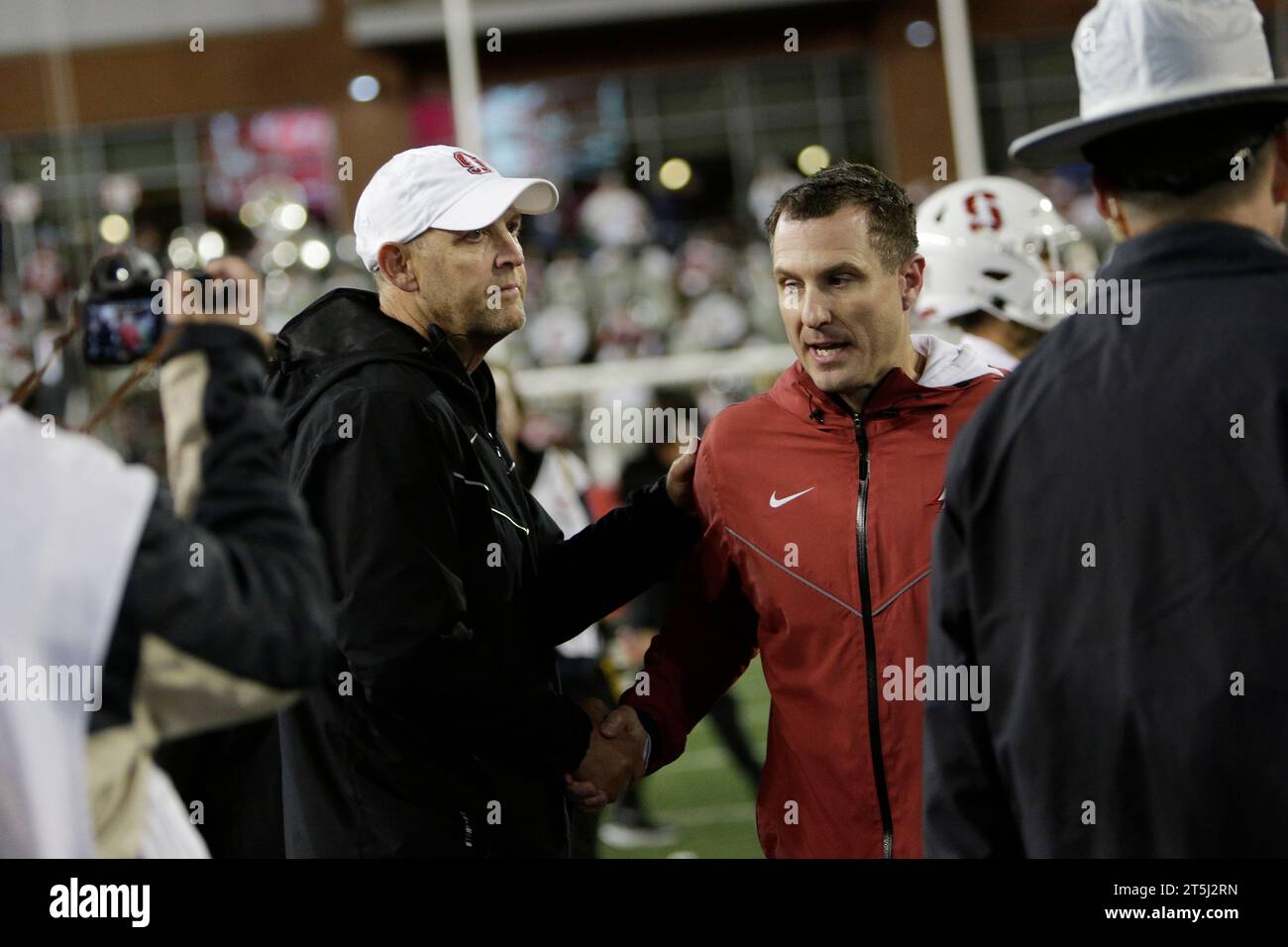 Stanford head coach Troy Taylor, left, and Washington State head coach ...