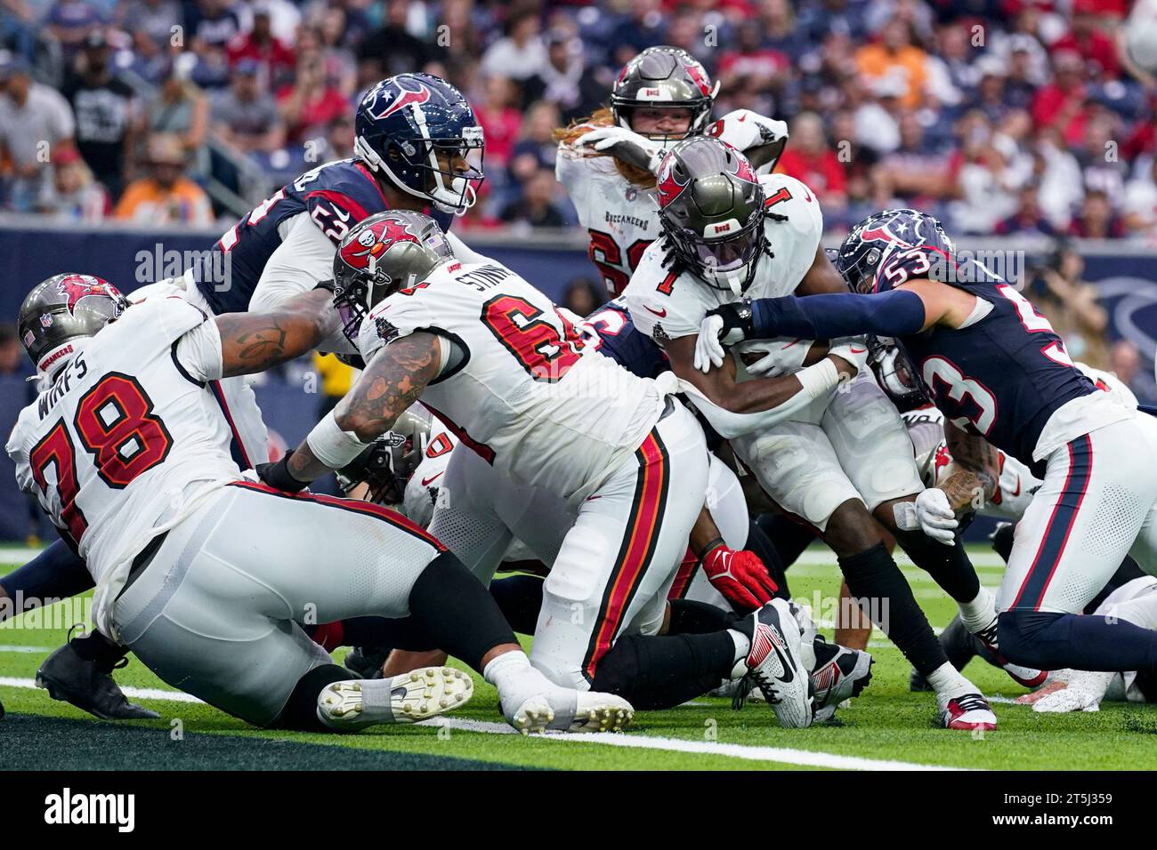 Tampa Bay Buccaneers running back Rachaad White (1) pushes through the ...