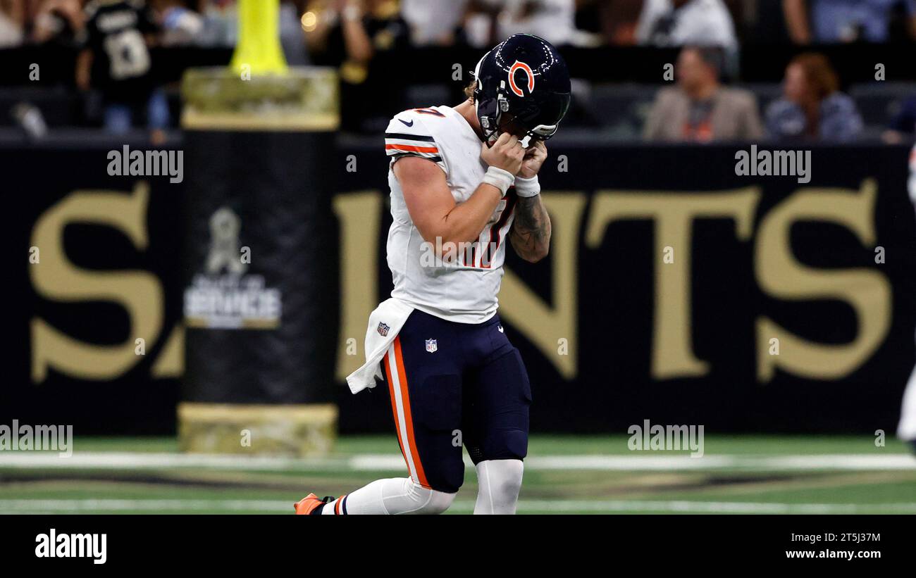 Chicago Bears quarterback Tyson Bagent (17) walks off the field after ...