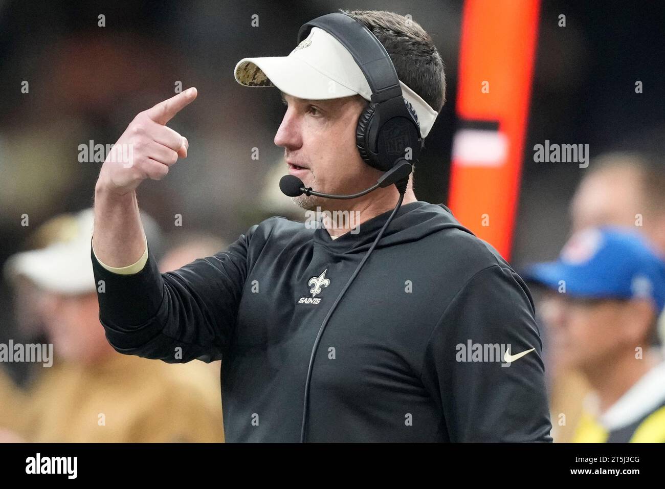 New Orleans Saints head coach Dennis Allen signals from the sideline ...
