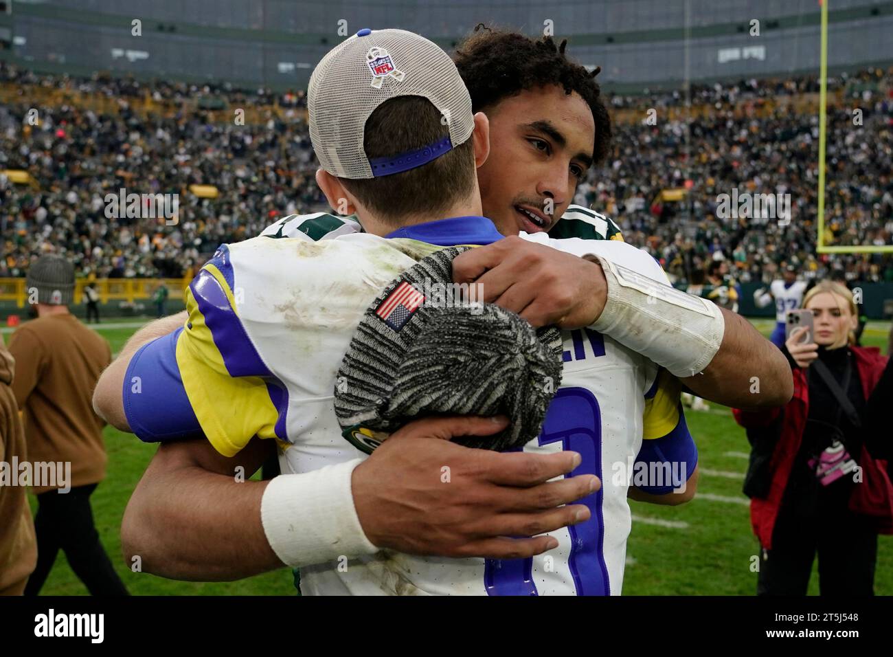 Green Bay Packers quarterback Jordan Love, back, and Los Angeles Rams ...