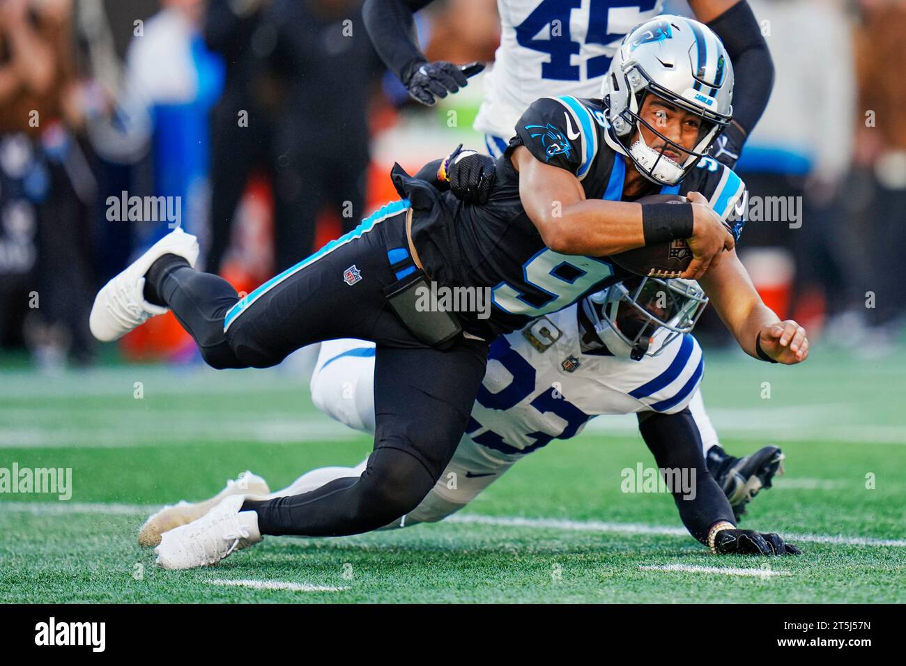 Carolina Panthers quarterback Bryce Young is tackled by Indianapolis ...