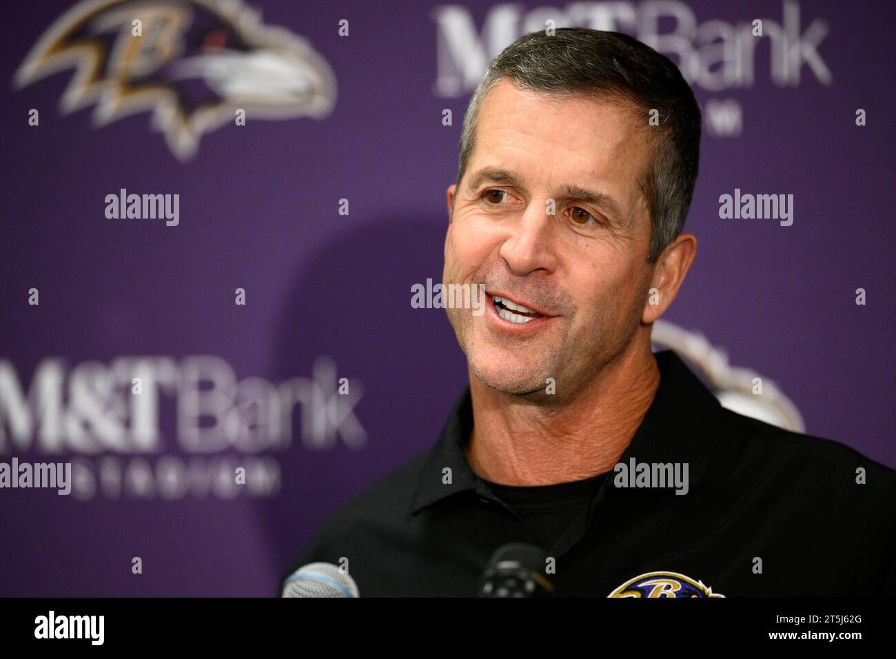 Baltimore Ravens head coach John Harbaugh speaks during a news ...