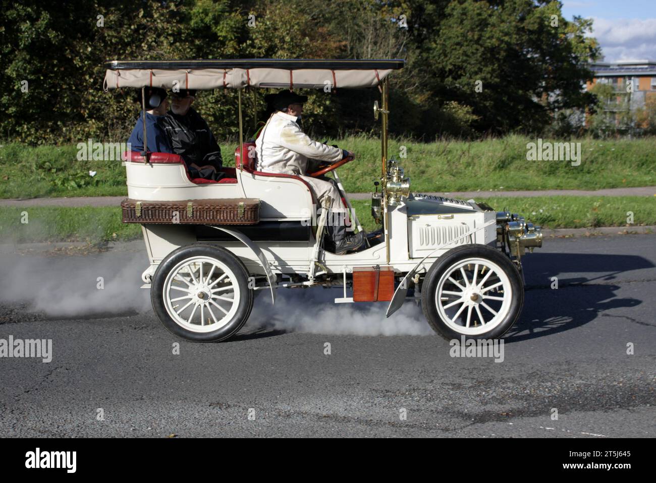 A steam driven 1903 White car taking part in the 2023 London to Brighton veteran car run Stock ...