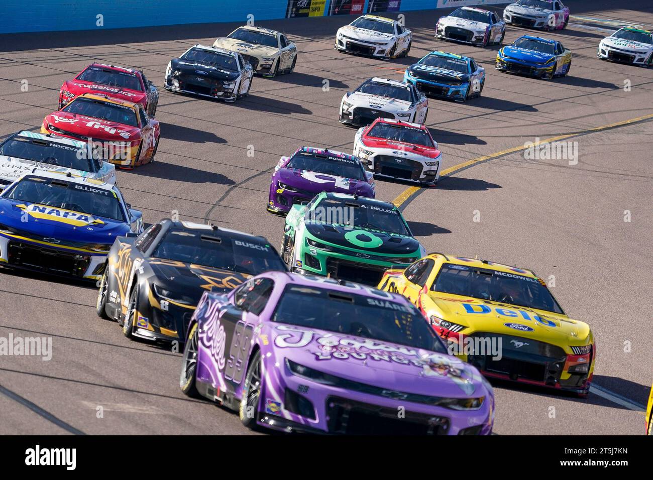 Cars take Turn 4 to start a NASCAR Cup Series Championship auto race at ...