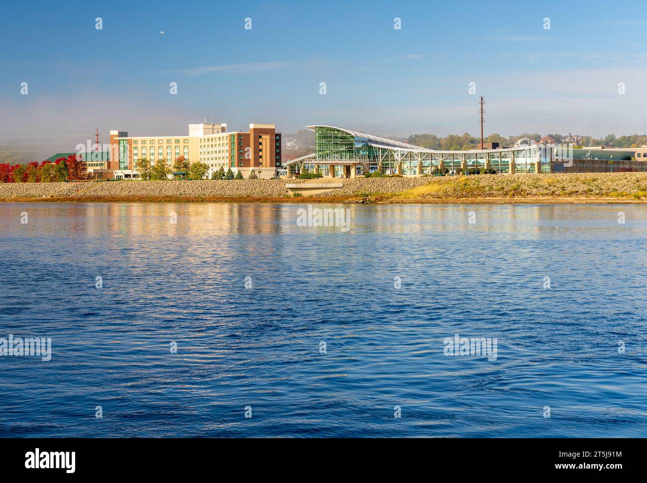 Casino hotel and convention center by Upper Mississippi on calm misty ...