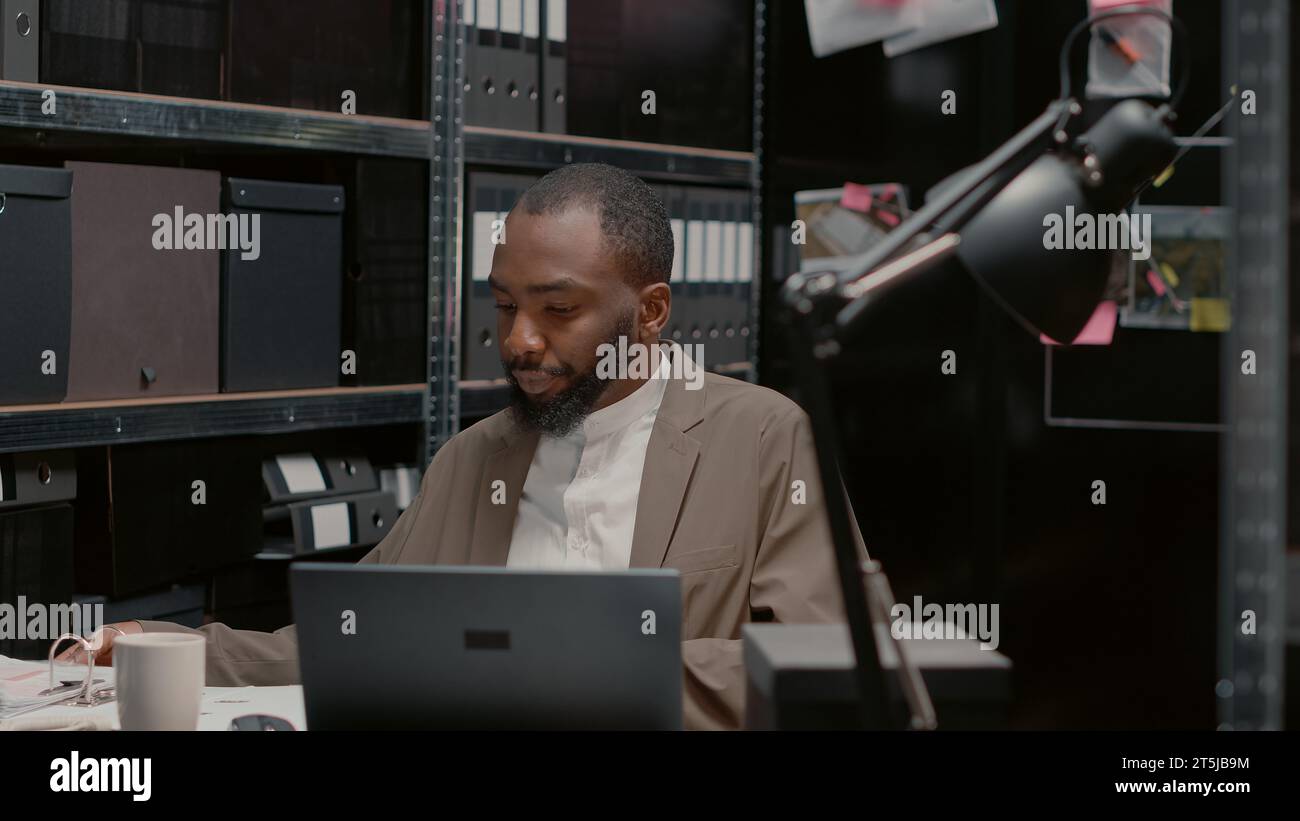 Inspector searching for forensic evidence in case file, analyzing clues ...