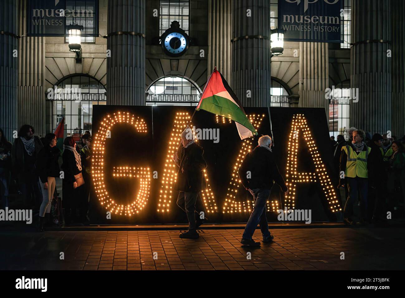 A large light-based banner with the word "Gaza" seen in front of Dublin ...