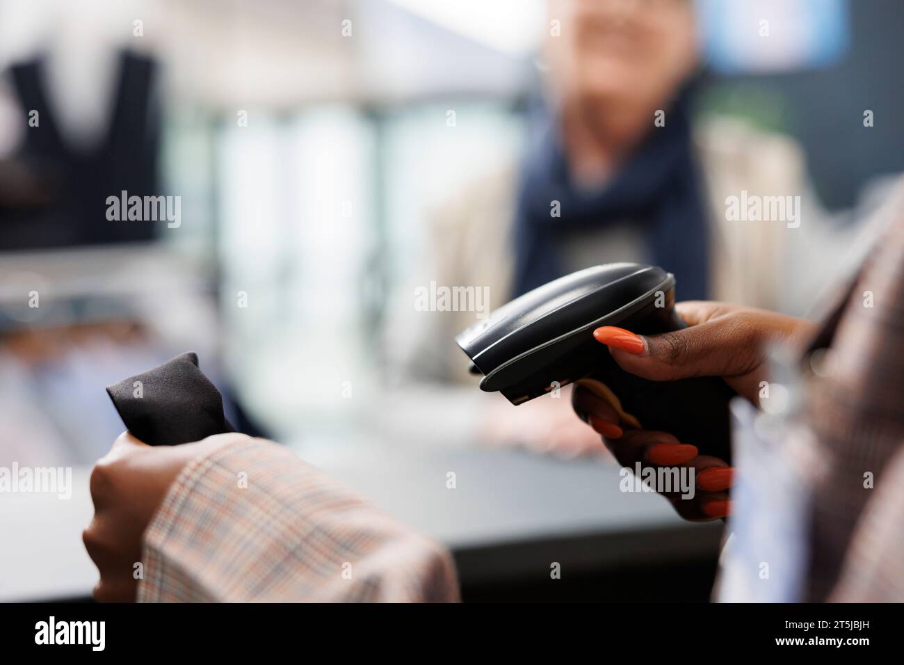 Woman shopper scanning barcode hi-res stock photography and images - Alamy