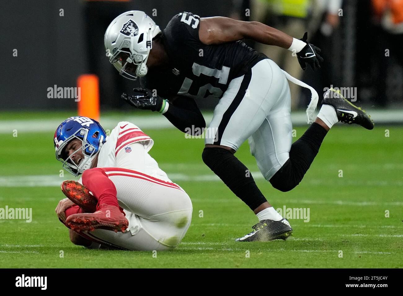 Las Vegas Raiders defensive end Malcolm Koonce (51) sacks New York ...