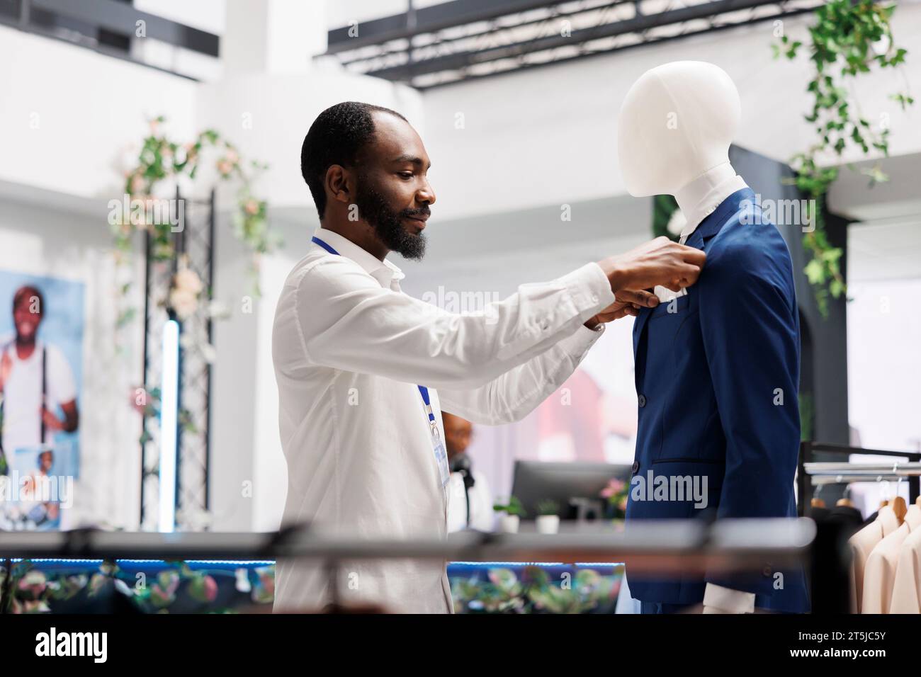 Male shop assistant suit jacket hi-res stock photography and images - Alamy