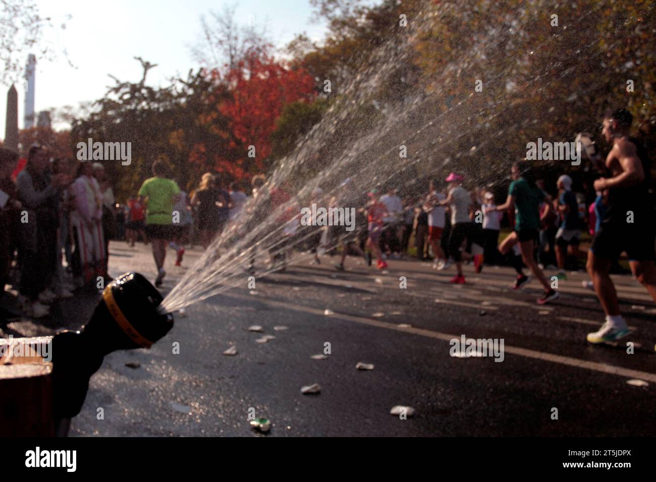 New york city marathon water spray hi-res stock photography and images ...