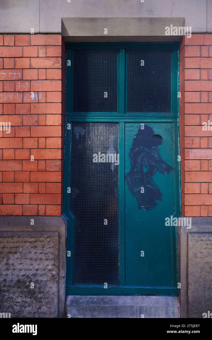 Broken window frame on outside of old red brick building in daytime ...