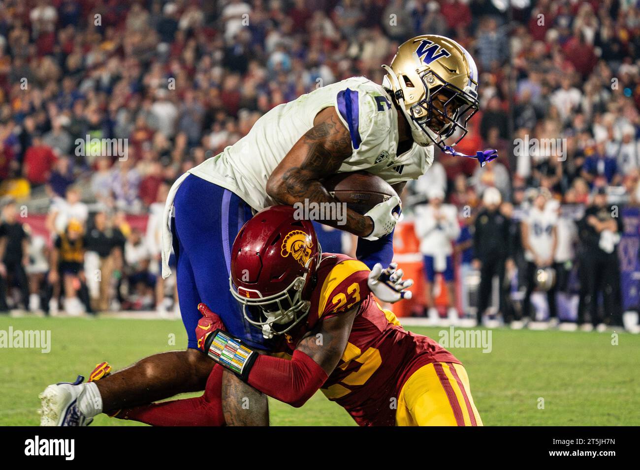 Washington Huskies wide receiver Ja'Lynn Polk (2) is tackled by USC ...