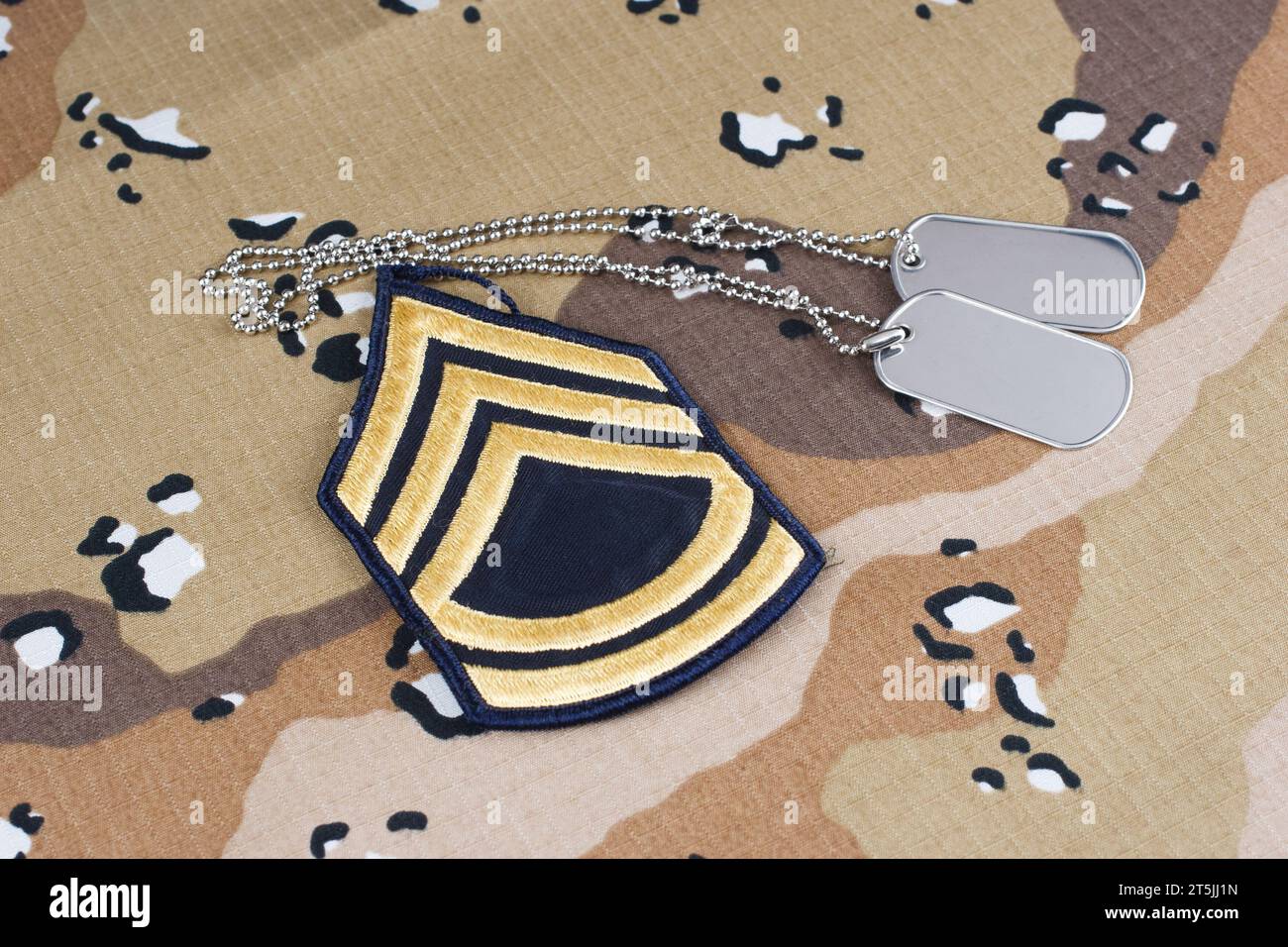 US ARMY Sergeant First Class rank patch and dog tags on Desert Battle ...