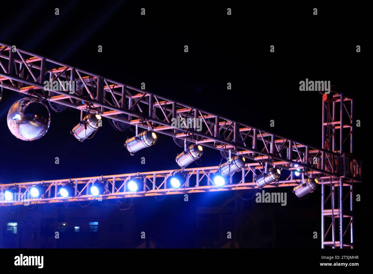 stage light on the metal frame in the dark Stock Photo - Alamy