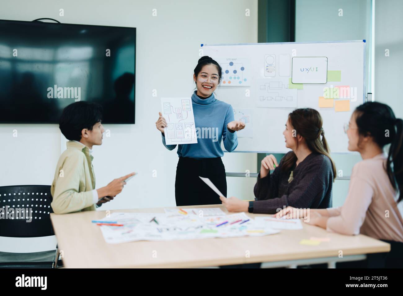 Group of asian creative team programing designers participate in all ...