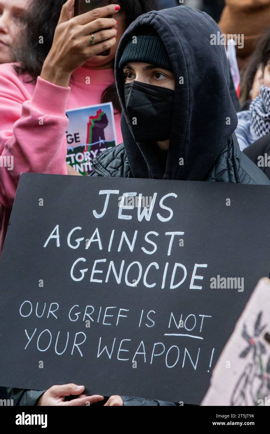London, UK. 4th November, 2023. A pro-Palestinian protester holds a ...